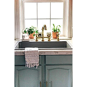 Kingston Brass KS3792AXBS Restoration Bridge Kitchen Faucet, 9", Polished Brass