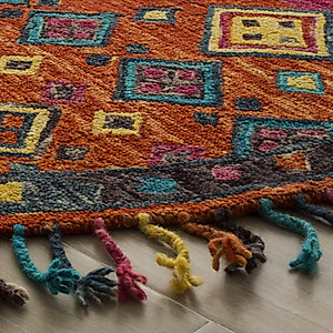 SAFAVIEH Aspen Collection Area Rug - 5' Round, Orange & Fuchsia, Handmade Boho Braided Tassel Wool, Ideal for High Traffic Areas in Living Room, Bedroom (APN138A)