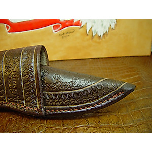 New Buck Vanguard Cross Draw Knife Sheath. Made of 10 Oz Water Buffalo Leather and Has a Rope Pattern Tooling with Random Patterning in the Center of the Sheath. Sheath ONLY!