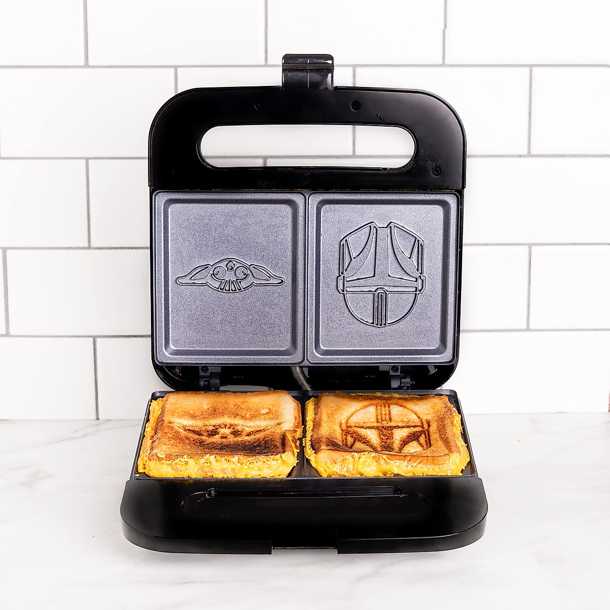 Uncanny Brands The Mandalorian Grilled Cheese Maker- Panini Press and Compact Indoor Grill- Baby Yoda and Mando Sandwich