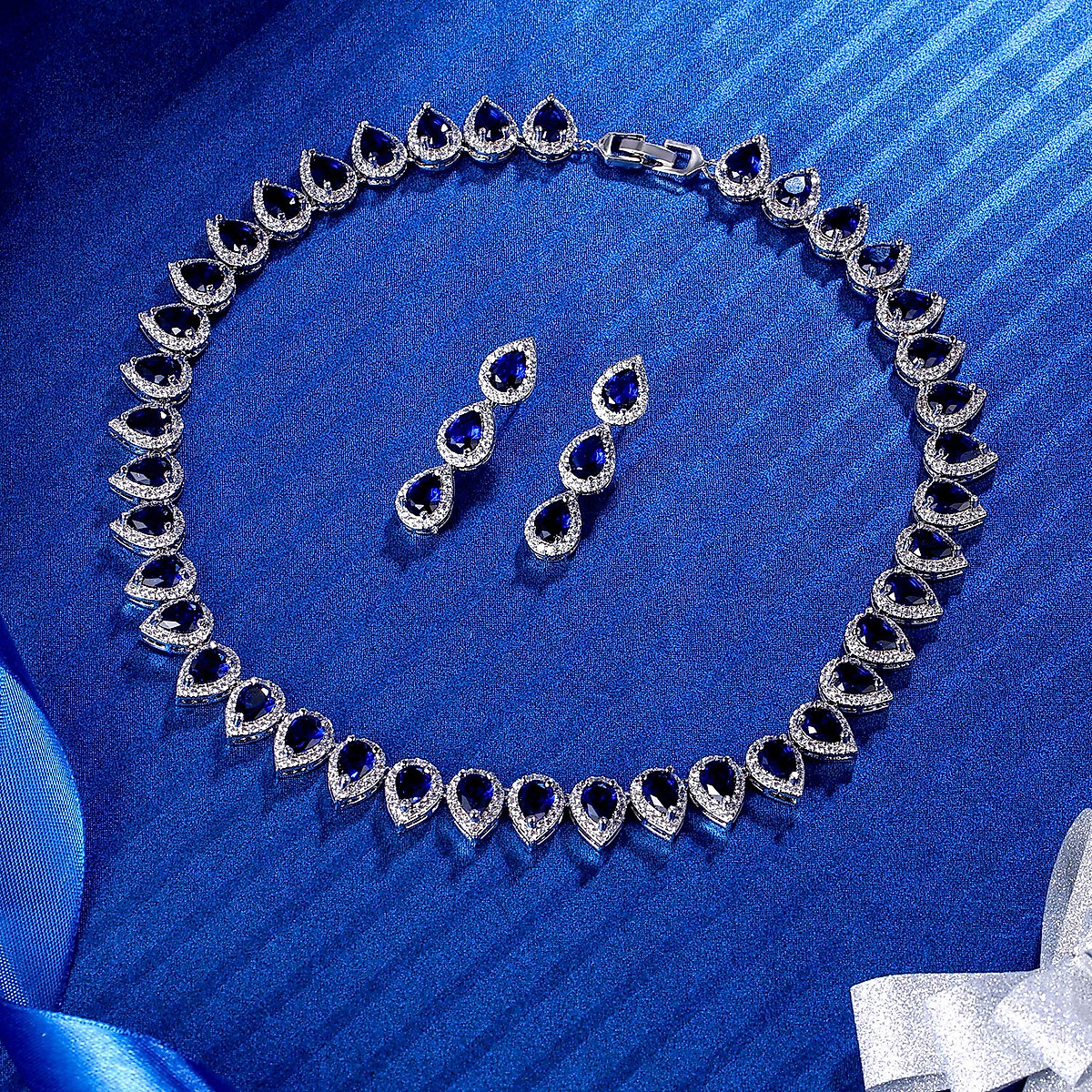 EleQueen Women's Silver-Tone Full Prong Cubic Zirconia Teardrop Bridal Necklace Earrings Set Sapphire Color