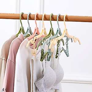 24 Pcs Travel Hangers with 48 Pcs Clips,Portable Folding Clothes Hangers Travel Clothes Hangers Travel Accessories Foldable Clothes Drying Rack for Travel Plastic Non Slip Clothing Hangers 4 Colors