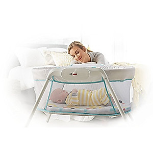 Fisher-Price Stow 'n Go Bassinet Windmill, portable baby cradle with soothing features for infants and newborns