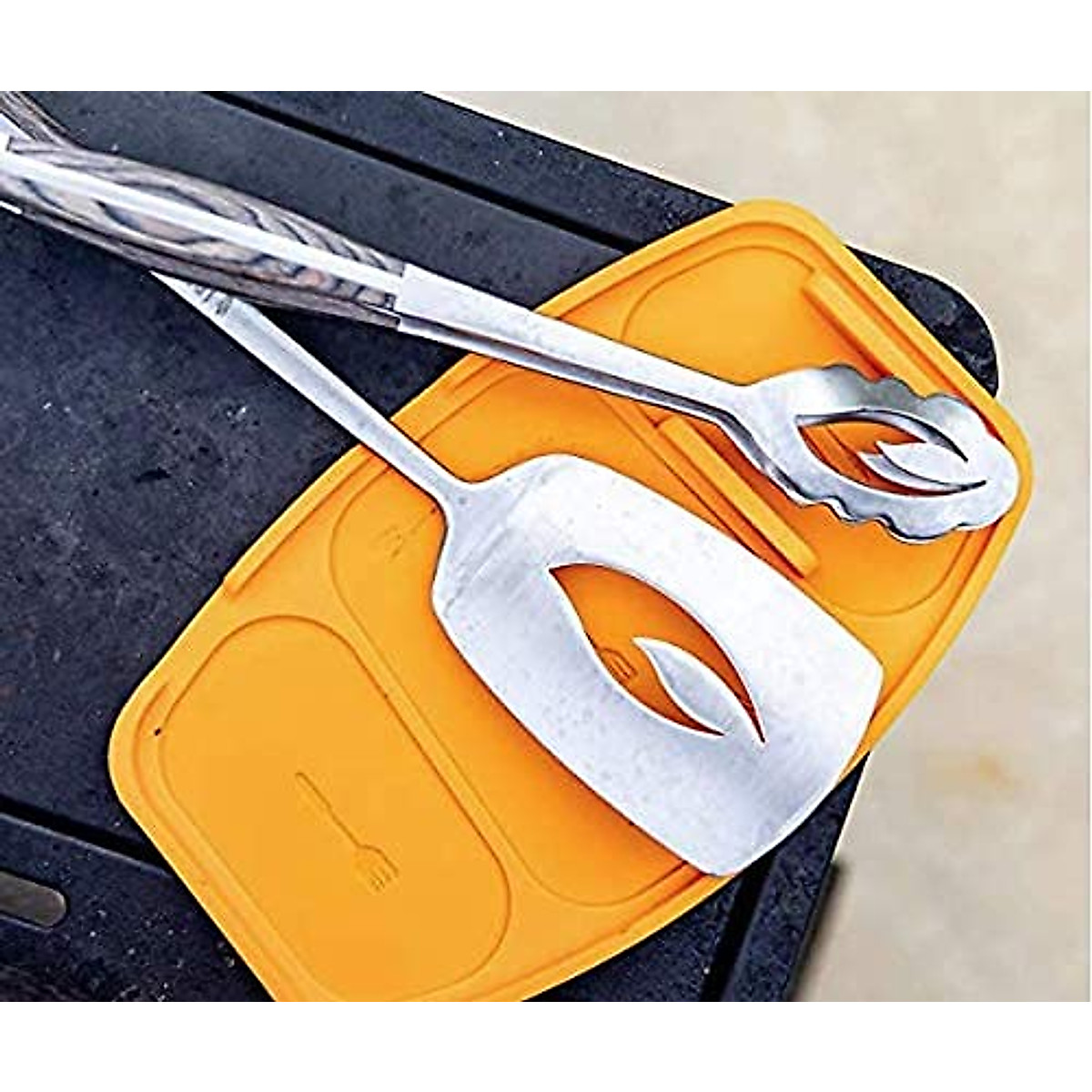 Ignite Silicone Grilling Trivet is a 100% Nonslip Silicone Tool That Holds Tongs, Spatula & BASTING Brush preventing Them from Contamination on The grill's Surface and Also Keeps Your Grill Clean.