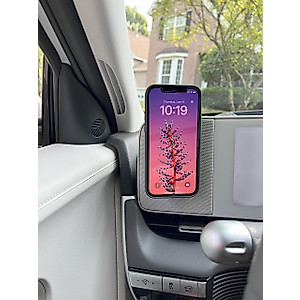 iPhone Holder Mount for Hyundai Ioniq 5. Attaches Magnetically to Metallic Dashboard. Compatible with MagSafe for iPhone 12/13/14/15 Series.