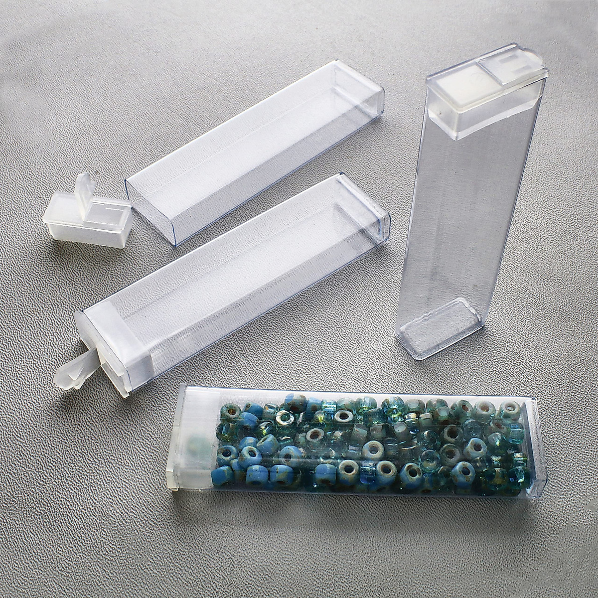 The Beadsmith Clear Plastic Boxes - Rectangle with a Flip Top Cap - 7/16” x 1” x 3-1/4” - Use for Beads, Bath Salts, Wedding & Party Favors, Home or Office Storage - Bag of 100