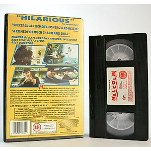 MALCOLM---A CRAZY GENIUS IN A MAD , BAD WORLD