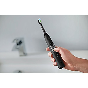 PHILIPS Sonicare ProtectiveClean 6500 Rechargeable Electric Power Toothbrush with Charging Travel Case and Extra Brush Head, Black, HX6462/08