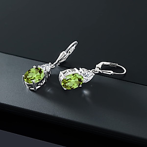 Gem Stone King 925 Sterling Silver Green Peridot and White Moissanite Dangle Earrings For Women (6.54 Cttw, Gemstone August Birthstone, Oval 10X8MM, Trillion 5MM)