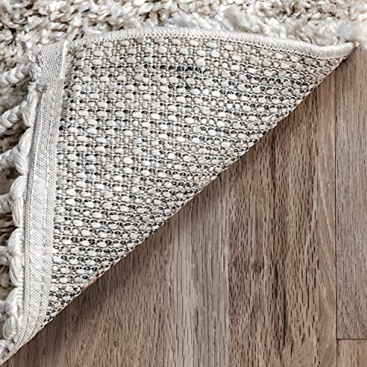 nuLOOM Brooke Shag Tasseled Area Rug, 5' 3" x 7' 7", Ivory