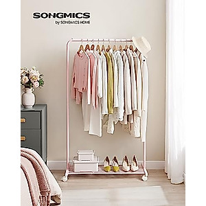 SONGMICS Clothes Rack with Wheels, 36 Inch Garment Rack, Clothing Rack for Hanging Clothes, with Dense Mesh Storage Shelf, 110 lb Load Capacity, 2 Brakes, Steel Frame, Jelly Pink UHSR025P01