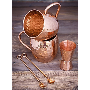 Copper jigger lacquered for the shine and to prevent tarnish. - Double 1oz/2oz copper measuring jigger for cocktail mixing. - Solid hammered copper 22G copper. - Copper shot glass for Moscow mule.