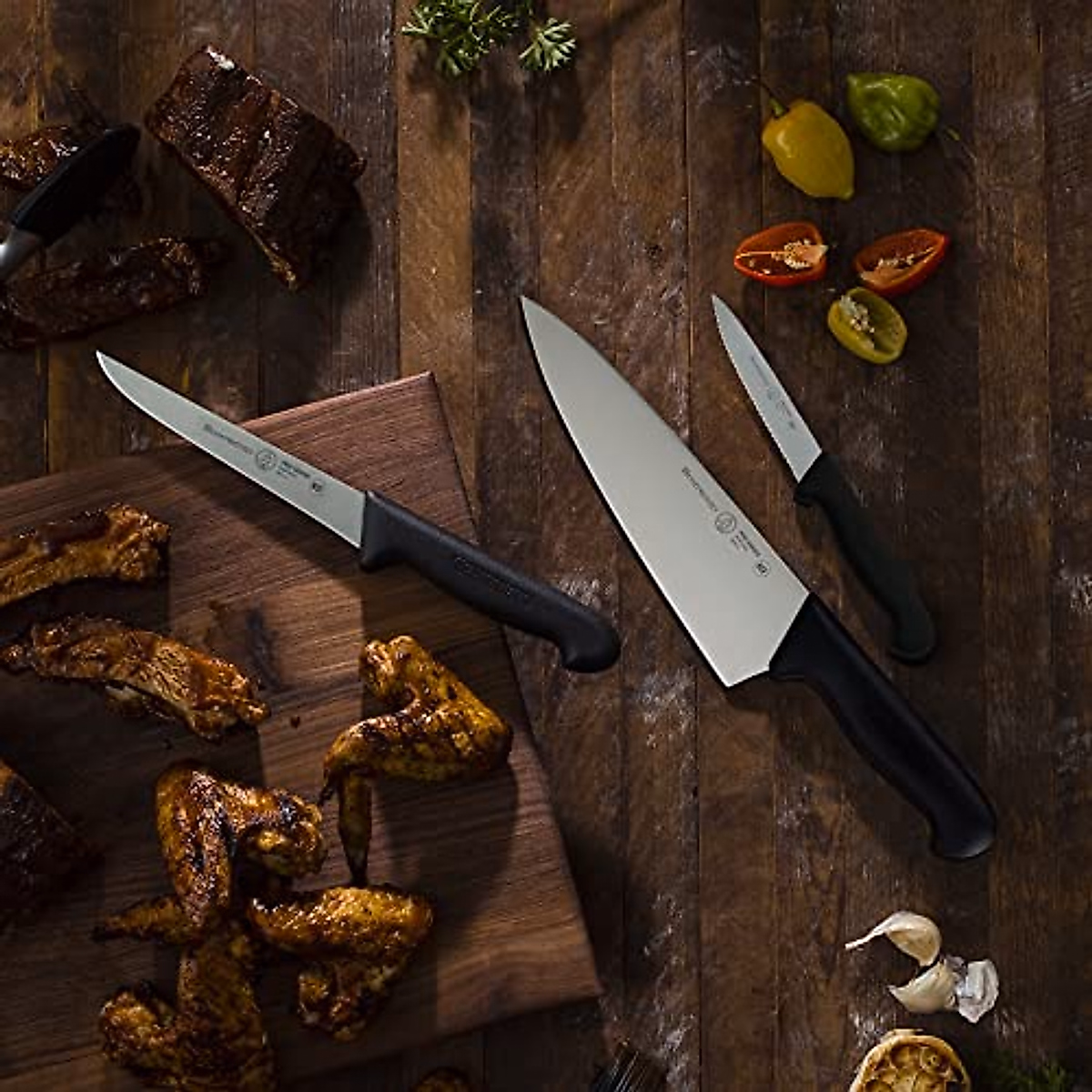 Messermeister Pro Series 4” Serrated Spear Point Paring Knife - German X50 Stainless Steel & NSF-Approved PolyFibre Handle - 15-Degree Edge, Rust Resistant & Easy to Maintain - Made in Portugal