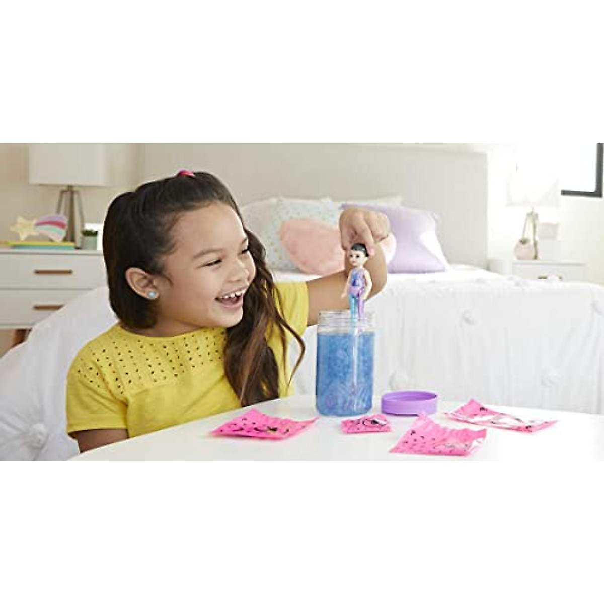 Barbie Color Reveal Chelsea Doll with 6 Surprises: 4 Mystery Bags, Water Reveals Doll's Look & Color Change on Bodice; Glitter Series; [Styles May Vary]