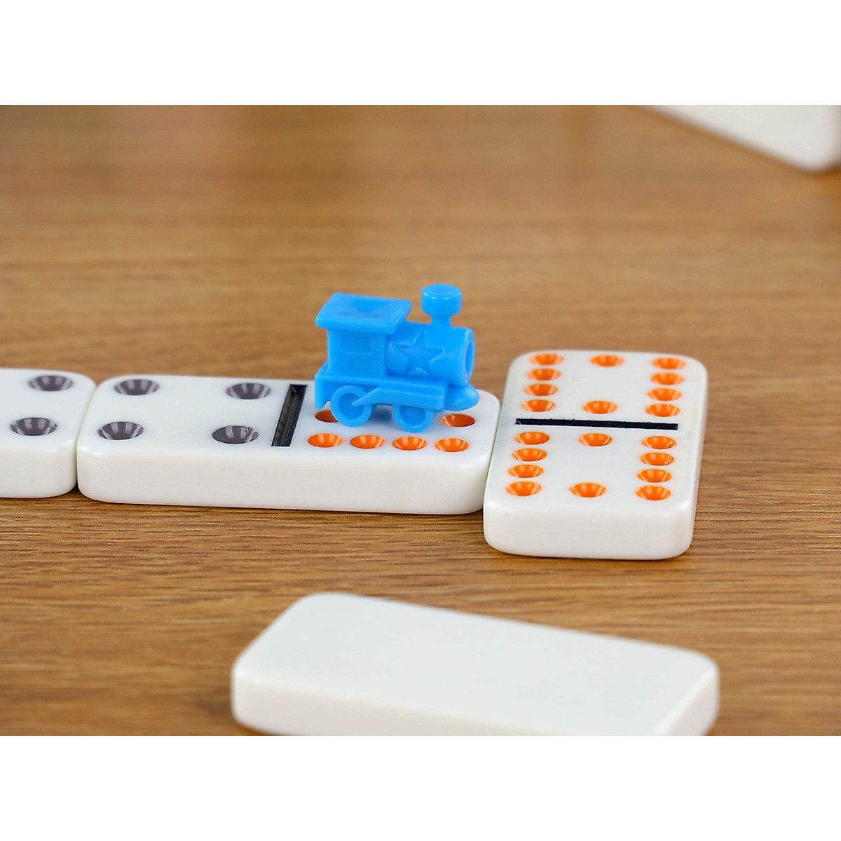 Regal Games â€“ Double 12 Dominoes â€“ Colored Dots Set â€“ Mexican Train Edition Set with, 91 Tiles, 4 Trains, Hub, & Collector's Tin - 2-8 Players Ages 8+ for Kids & Adults