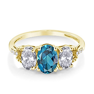 Gem Stone King 10K Yellow Gold London Blue Topaz White Topaz and Diamond Accent Engagement Ring For Women (2.22 Cttw, Oval Gemstone Birthstone, Available in size 5, 6, 7, 8, 9)