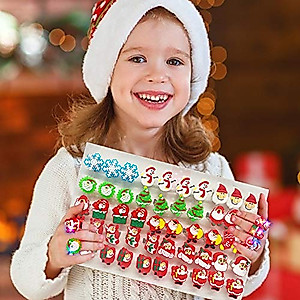 TURNMEON 50 Pack LED Light Up Ring Christmas Party Favors Stocking Stuffers for Kids Flashing Glow in The Dark Funny Christmas Party Supplies Toy Gift Boys Girls Christmas Party Favors Decorations