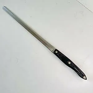 CUTCO Model 1724 Slicer...........9.8" High Carbon Stainless Double-D® (DD) serrated blade.......5.7" Classic Brown handle (sometimes called black)...........in factory-sealed plastic bag.