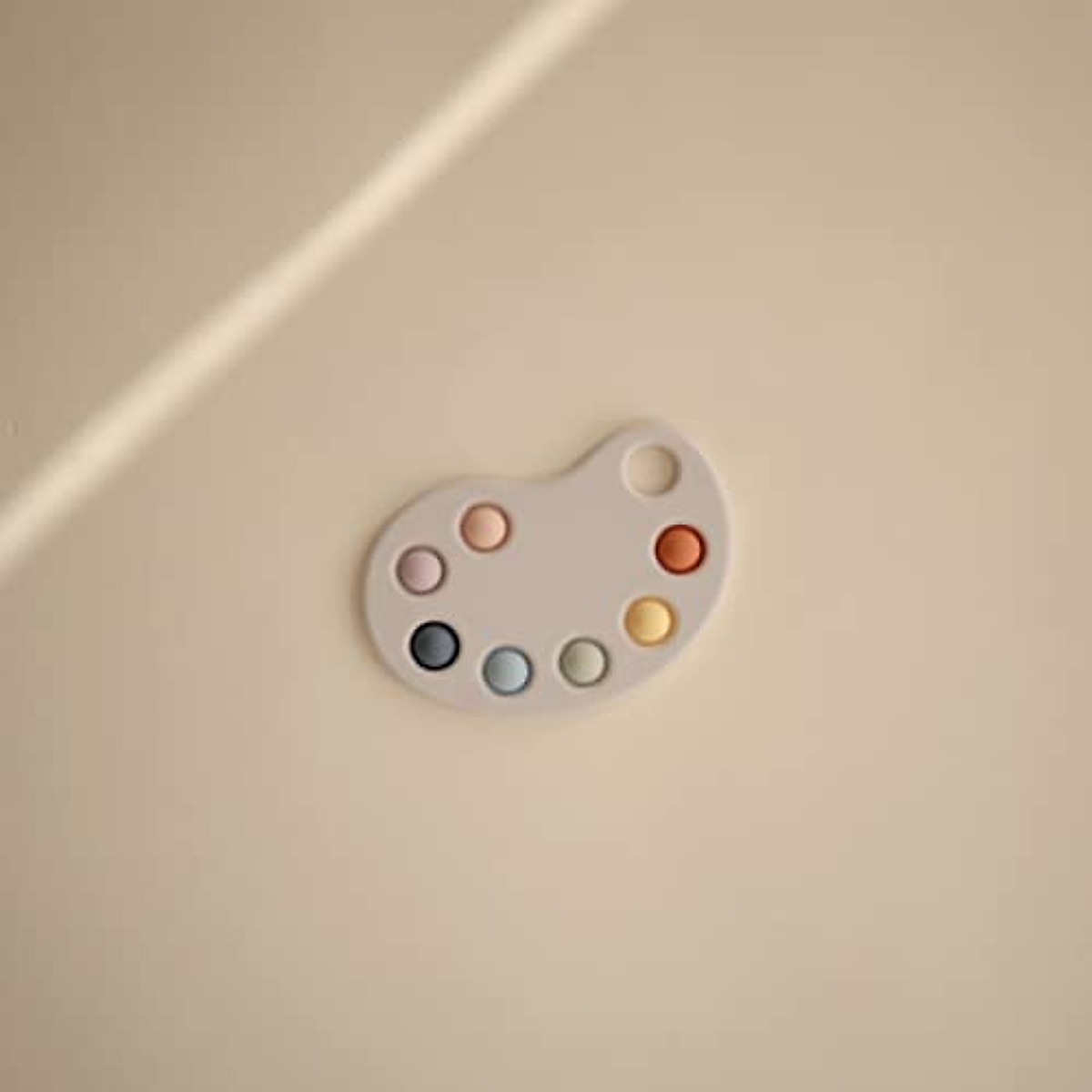 mushie Paint Palette Press Toy