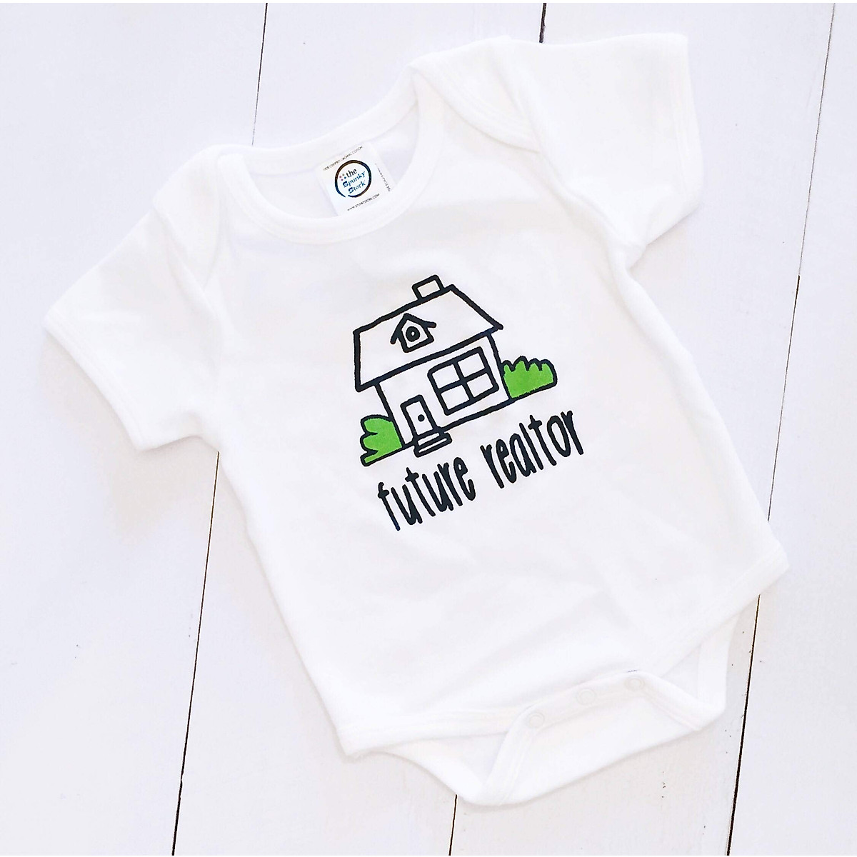 The Spunky Stork Baby Boys and Girls Future Realtor Real Estate Agent Bodysuit (12-18M) White
