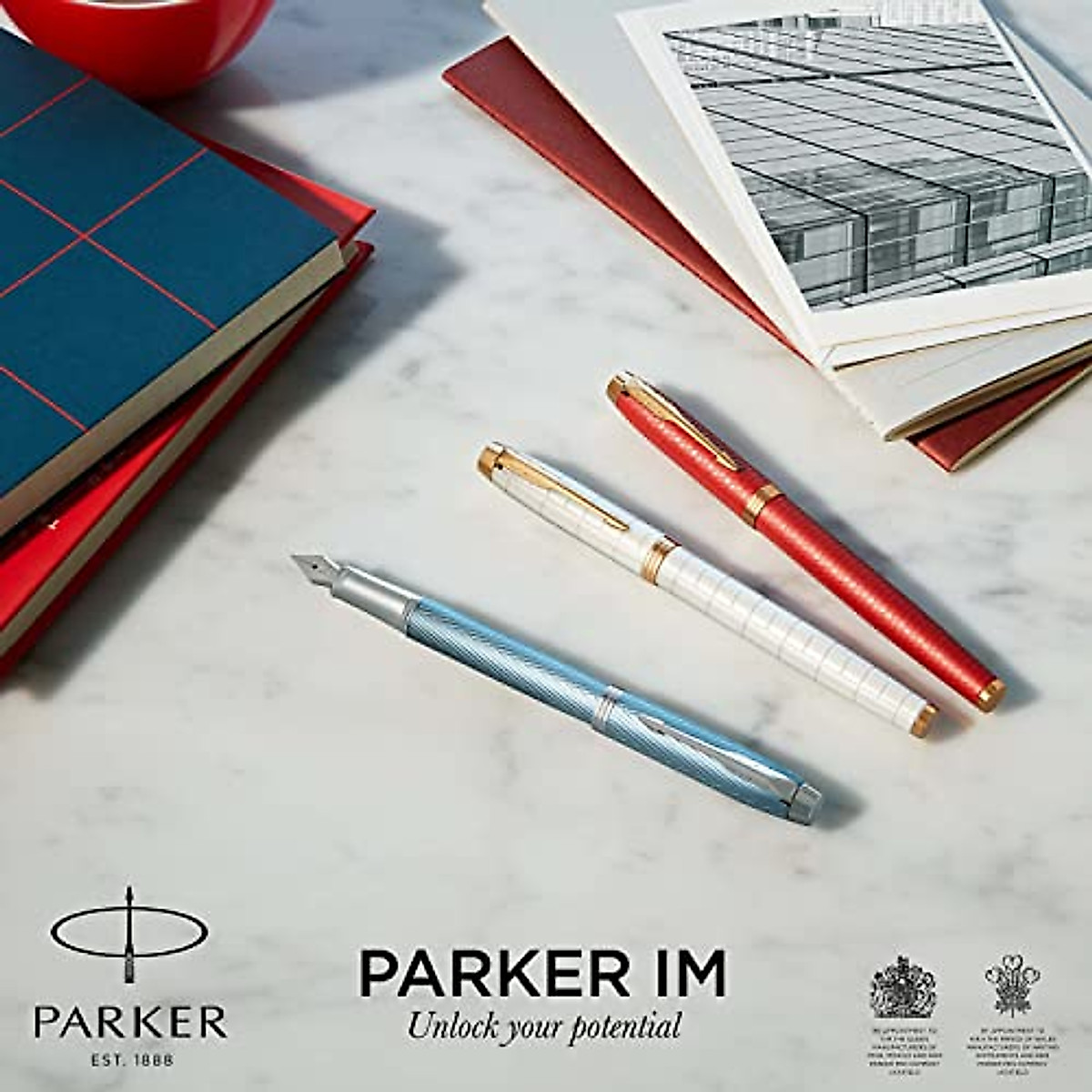PARKER IM Rollerball Pen, Premium Warm Silver with Fine Point Black Ink Refill (1931686)