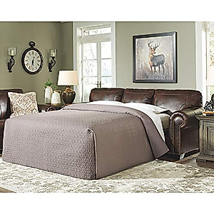 Signature Design by Ashley Roleson Traditional Leather Queen Sofa Sleeper with Nailhead Trim and 4 Accent Pillows, Brown