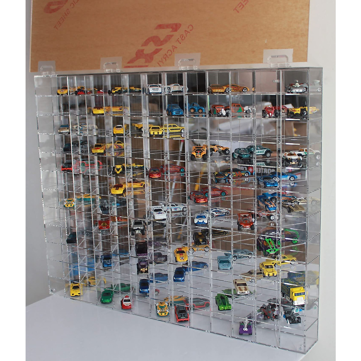DisplayGifts Clear Acrylic Display Case for 1:64 Scale Hot Toy Cars Wheels Model Cars Display with 144 Compartments in 45 Degree Angle, Clear, UV Protect 22.5 X 30.4 X 3 Inches, Wall Mounted Storage