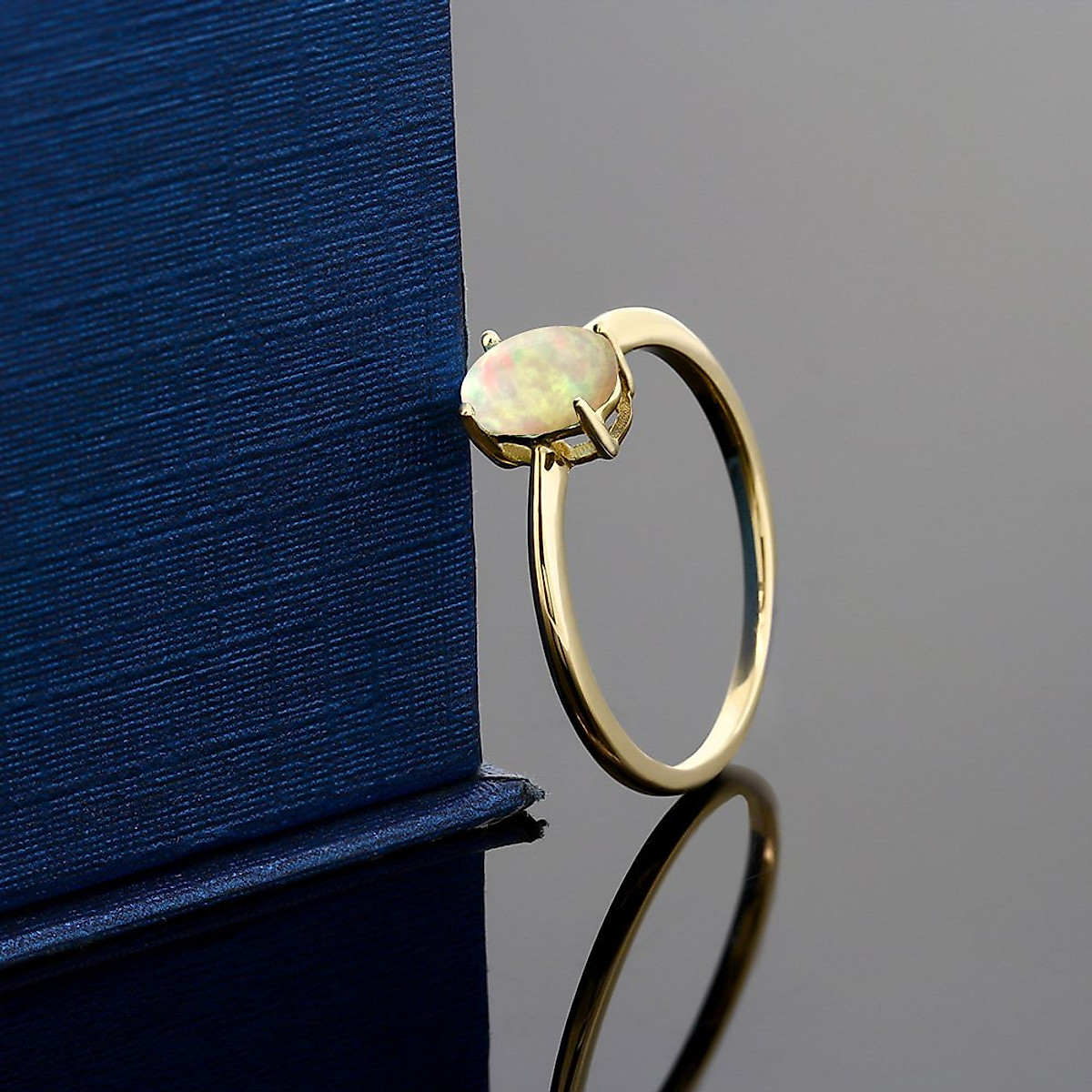 Gem Stone King 10K Yellow Gold White Ethiopian Opal Solitaire Engagement Ring For Women | 0.51 Cttw | Oval Cabochon 7X5MM | Gemstone October Birthstone | Available In Size 5-10