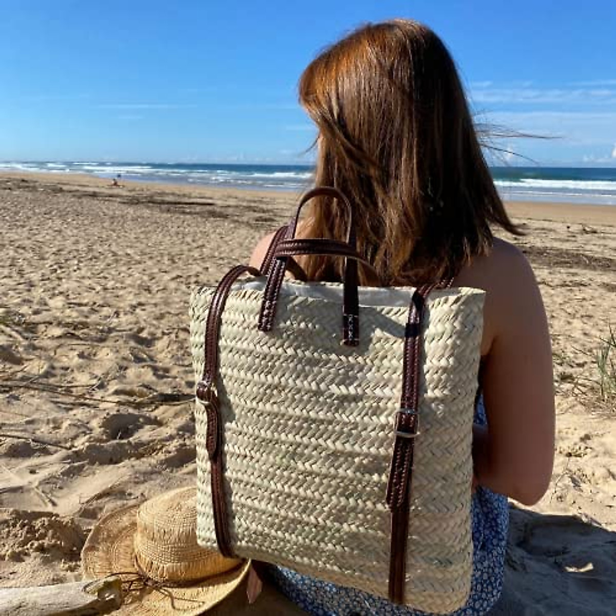 LA Collections Natural Straw and Leather Bag, Backpack, Tote, Adjustable Leather Straps, Perfect for Beach, Shopping, Market, Picnic, Music festival. Handcrafted by Moroccan artisans.