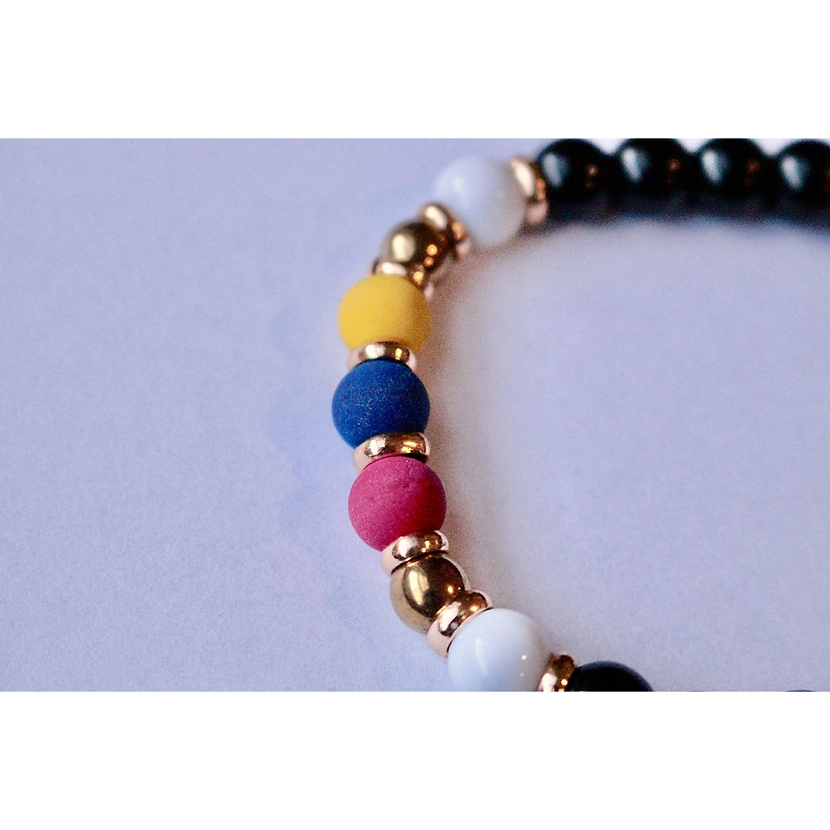 CharmsOfTheWorld Handmade Bracelet from Medellin - Colombia Flag Colors - Cat's eye gemstone and steel beads - Sliding Knot