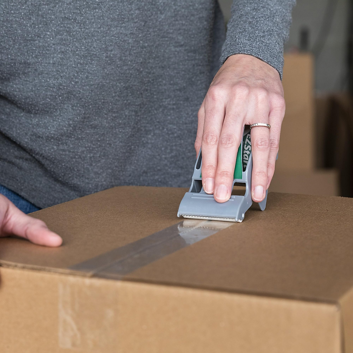 Duck EZ Start Packaging Tape, Single Roll with Dispenser, Clear Packing Tape for Mailing, Moving, Shipping & Storage, Quiet Easy Start Tape for Boxes & Shipping, 1.88 In. x 55.5 Yd. (1259457)