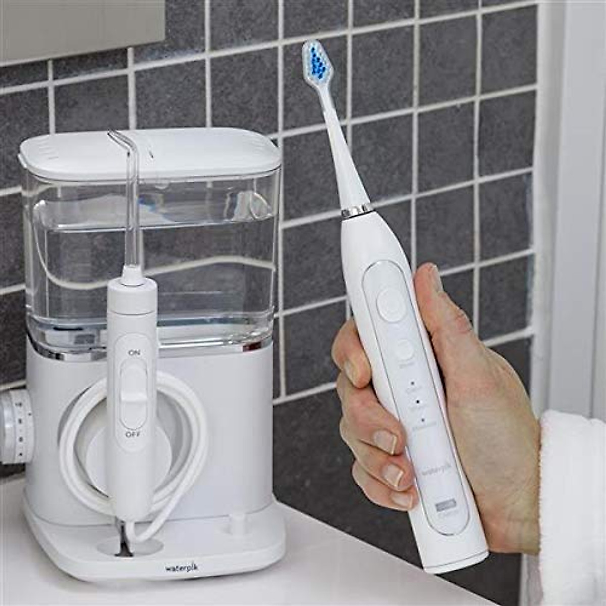 Waterpik Complete Care 9.0 Kit. 1 White Complete Care 9.0 Sonic Electric Toothbrush & Water Flosser, 2 Pack Plaque Seeker Water Flosser Tip Replacement, & 2 Pack Complete Care Replacement Brush Heads