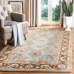 SAFAVIEH Heritage Collection Area Rug - 8'3" x 11', Blue & Brown, Handmade Traditional Oriental Wool, Ideal for High Traffic Areas in Living Room, Bedroom (HG812B)