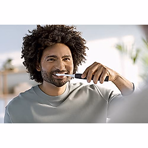 Philips Sonicare 4100 Rechargeable Electric Toothbrush, with Pressure Sensor, 2 Intensity Settings, SmarTimer and QuadPacer, 14-Day Battery Life, Black, Model HX3681/24