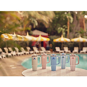 Stanley Quencher H2.0 Tumbler with Handle and Straw 30 oz | Flowstate 3-Position Lid | Cup Holder Compatible for Travel | Insulated Stainless Steel Cup | BPA-Free | Cream Royal