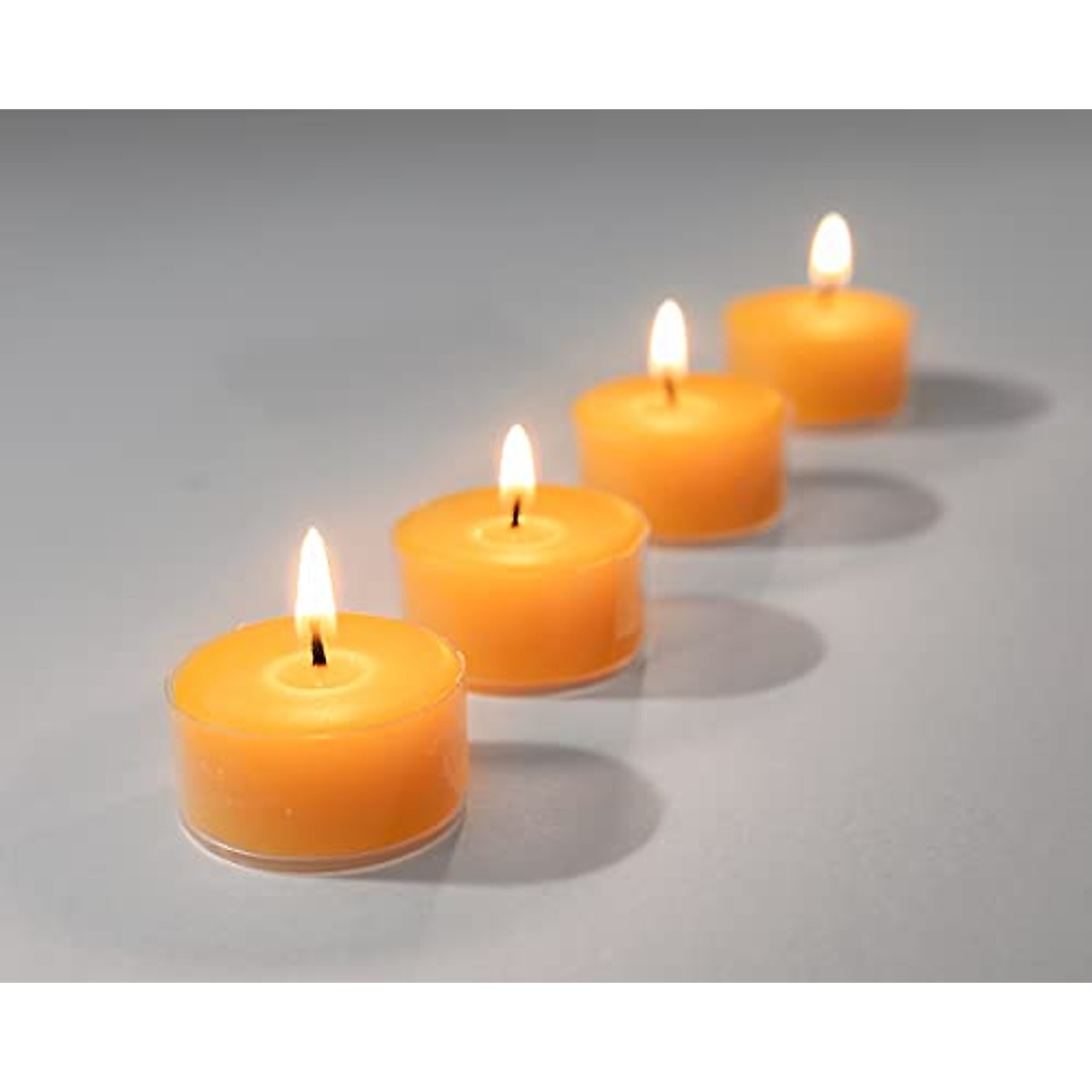 The Beeswax Co Tea light Beeswax Candles - Natural Honey Scented - For Home - Long-Lasting & Eco-Friendly - Cotton Wick - Slow Burning - Hand Poured Pure Organic Bees Wax - Set of 24 Tealights (Clear)