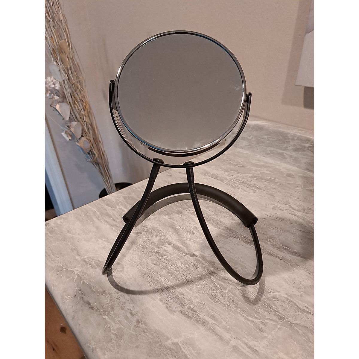 "The Mirrorcle" Great for viewing back of head, traveling, makeup, cutting hair. Cushioned cable is new for comfort to contour to your neck. Std viewing 1 side & 5X on opposite side.