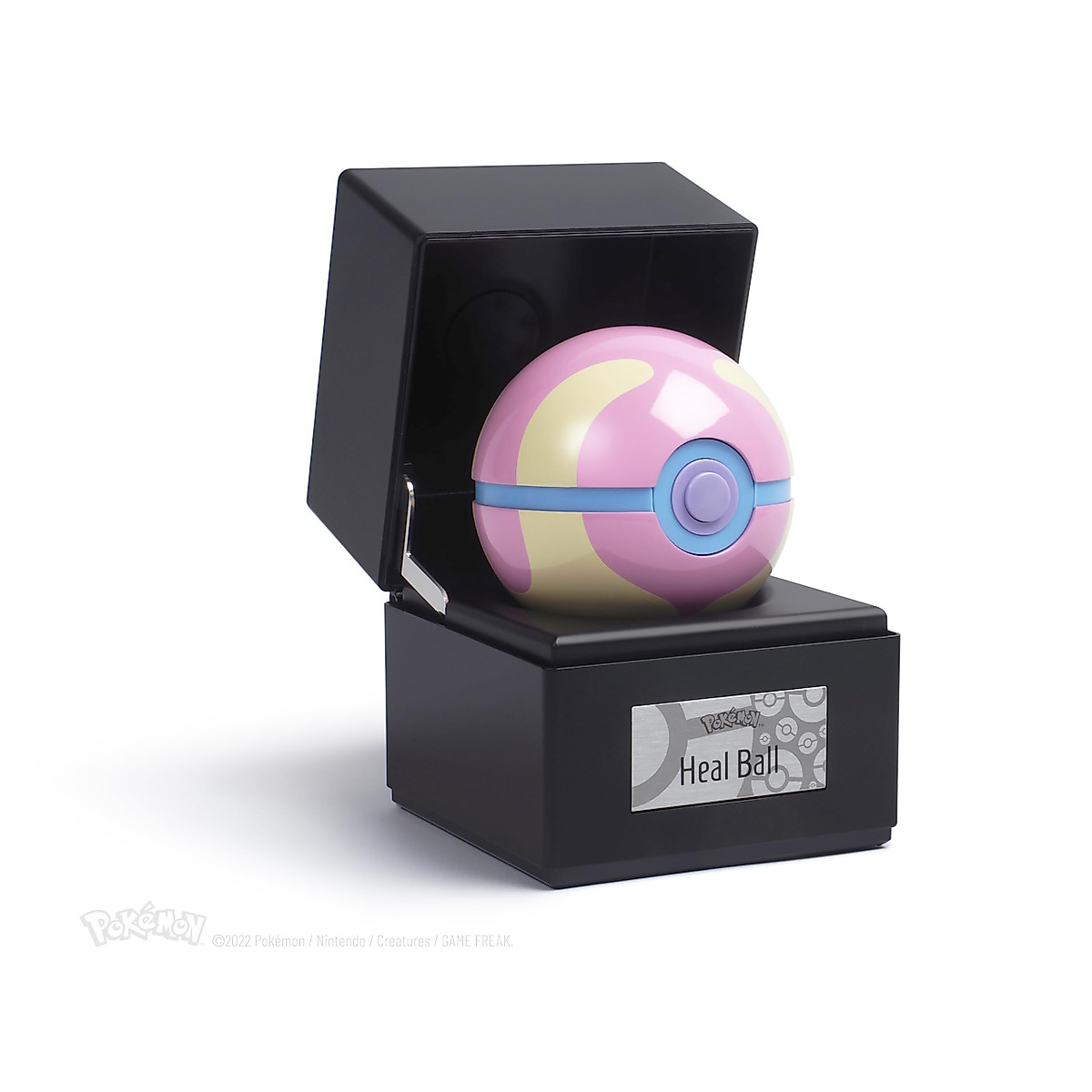 Pokémon Poké Ball Authentic Replicas - Realistic, Electronic, Die-Cast Poké Ball with Display Case Light Features - by The Wand Company (Heal Ball)