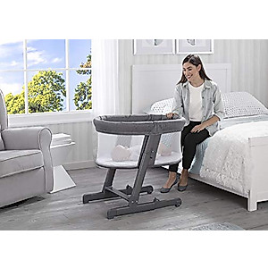 Simmons Kids Oval City Sleeper Bedside Bassinet - Adjustable Height Portable Crib with Wheels & Airflow Mesh, Grey Tweed 31.5x19.7x30 Inch (Pack of 1)