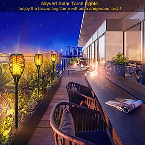 Aityvert Solar Lights, 43" Flickering Flames Torch Lights Outdoor Waterproof Landscape Decoration Lighting Dusk to Dawn Auto On/Off Security Flame Lights for Yard Garden Pathway Driveway 4-Pack