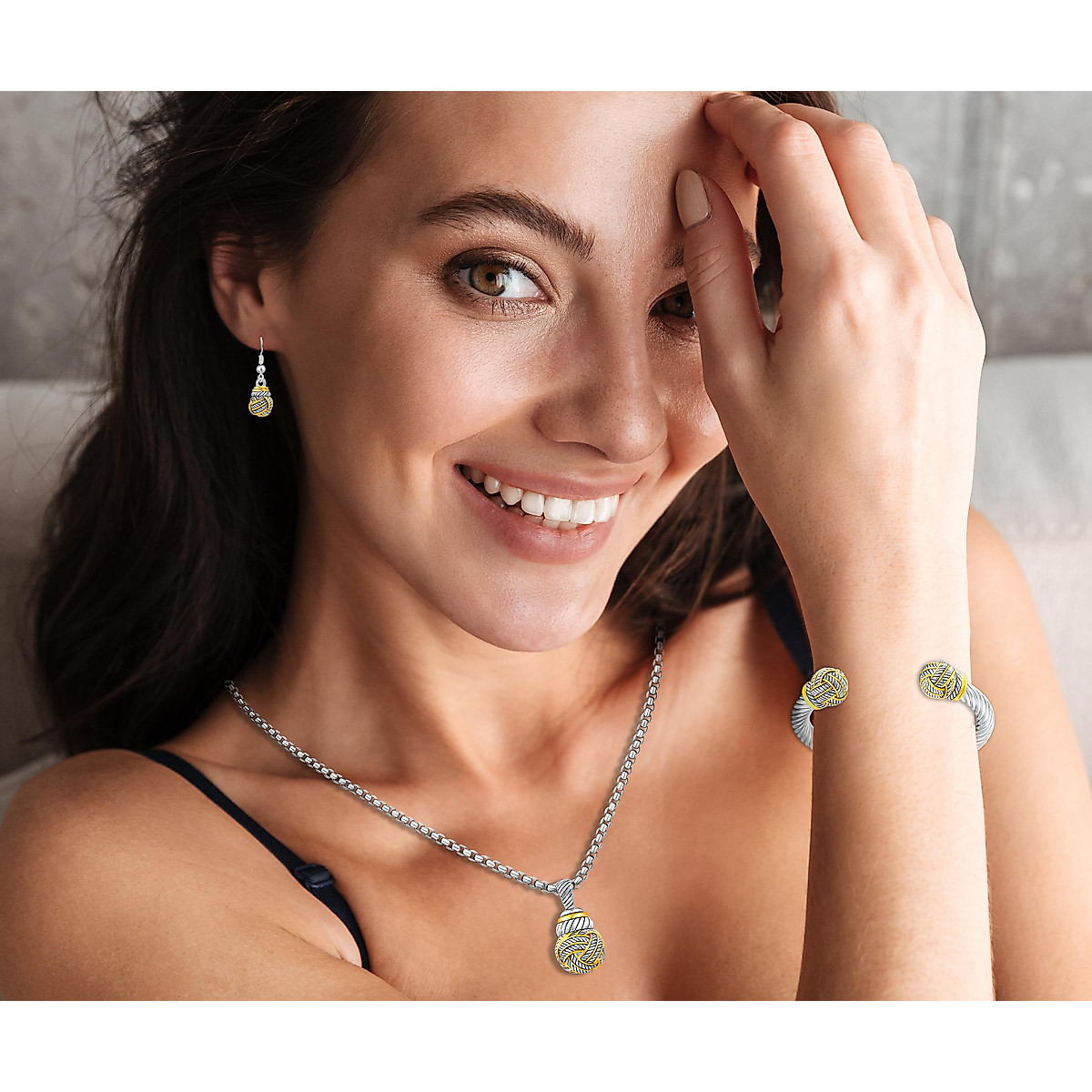 UNY Jewel Jewelry Make a Statement With Our Two Tone Twisted Cable Wire Dangle Ball Fish Hook Earrings Featuring Detailing Perfect For Any Occasion