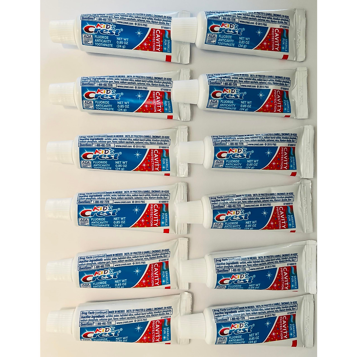 Kid’s Crest Cavity Protection Sparkle Fun Toothpaste .85 Ounce (12 Pack) | Sparkle Fun Flavor with Fluoride | Travel Size Anticavity Paste (B07NBR4LCB)