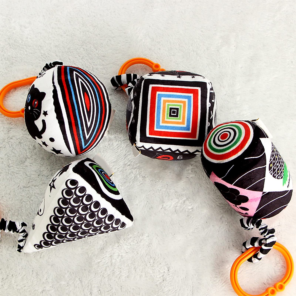 KAKIBLIN Baby Hanging Rattle Toys, 4 Pack Black and White Car Seat Baby Toys Soft Squeaky Stroller Toy for Baby Montessori Sensory Toys 0-12 Months for Newborn Infant, White and Black