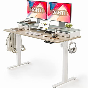 BANTI 55"x 26" Electric Standing Desk with Glass Top Monitor Stand, Adjustable Sit Stand Up Table with Double Drawer, Sit Stand Desk with Storage Shelf, Light Walnut Top