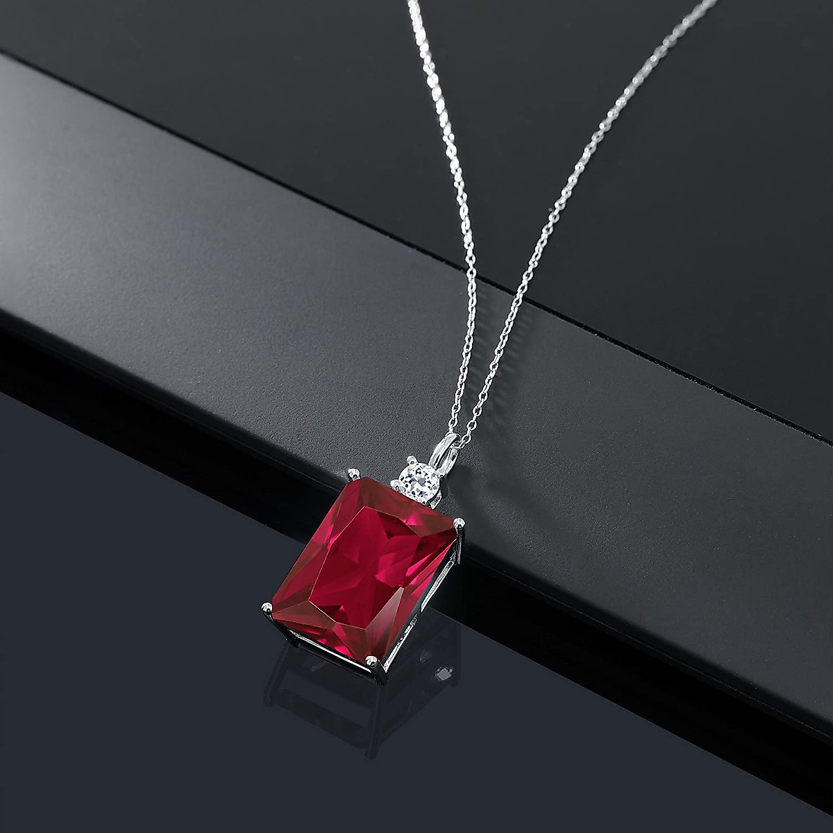 Gem Stone King 925 Sterling Silver Red Created Ruby and White Topaz Pendant Necklace For Women (20.33 Cttw, Emerald Cut 18X13MM, With 18 Inch Silver Chain)