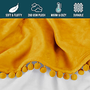 PAVILIA Mustard Yellow Throw Blanket Pom Pom for Couch, Twin Size, Soft Fleece Cozy Pompom Fringe Sofa Blanket, Decorative Home Gift Flannel Velvet, Gold Yellow, 50x60