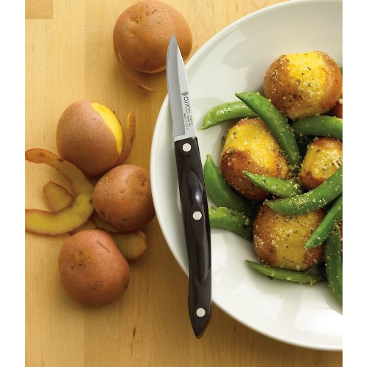 CUTCO Model 1720 Paring Knife with 2¾" High Carbon Stainless blade and 5" classic dark brown handle (often called"black") in factory-sealed plastic bag.