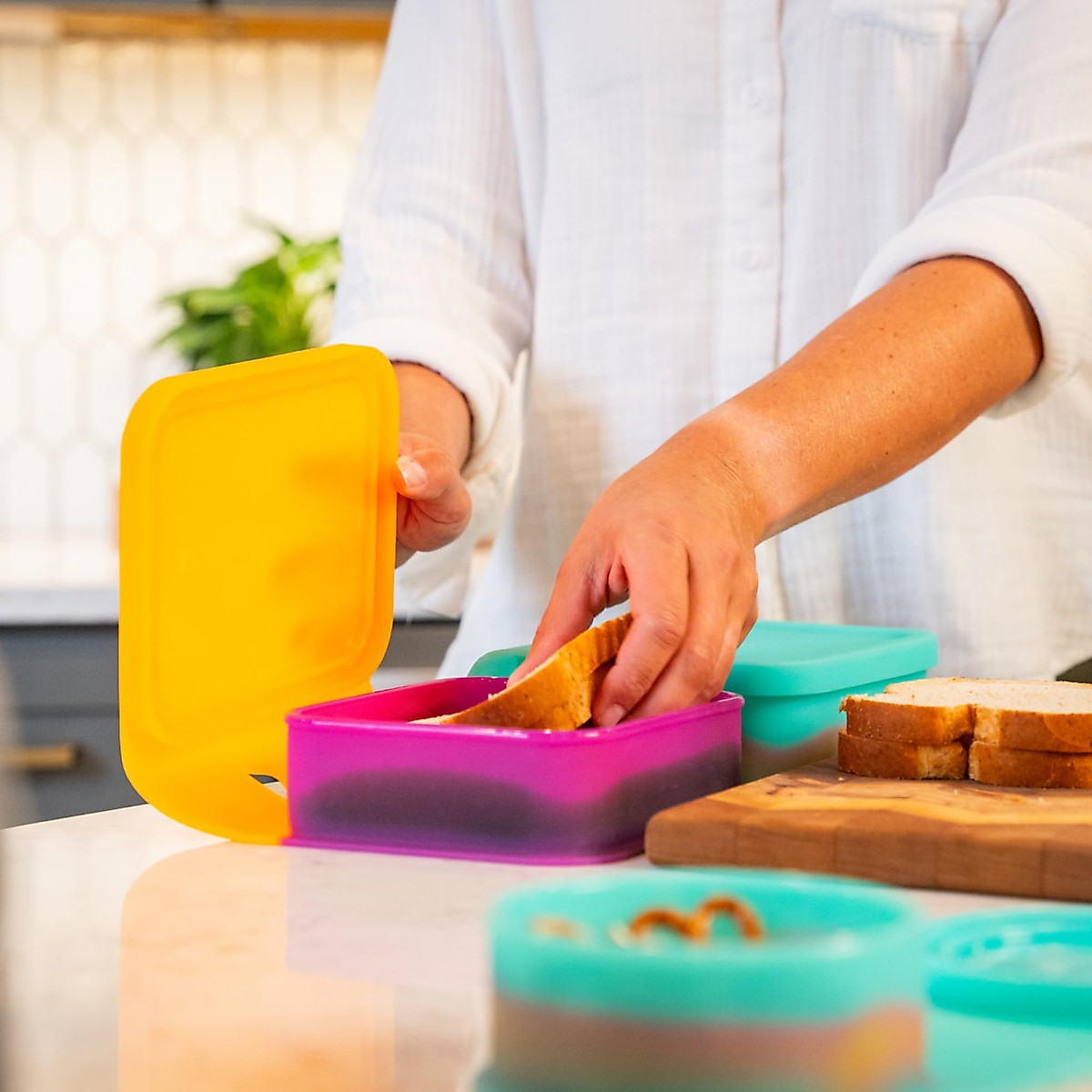 Silipint: Silicone Go Go Bowls: Set of 4: Sun Storm - Sizes: 10, 20, 30 oz & Sandwich Size - Microwavable, Attached Lid, Sustainable