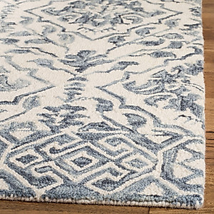SAFAVIEH Dip Dye Collection Area Rug - 9' x 12', Blue & Ivory, Handmade Wool, Ideal for High Traffic Areas in Living Room, Bedroom (DDY901M)