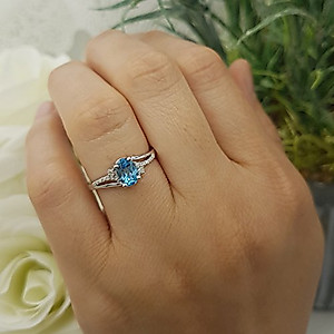 Dazzlingrock Collection 7X5 MM Oval Blue Topaz & Round Diamond Ladies Engagement Ring in 925 Sterling Silver, Size 8